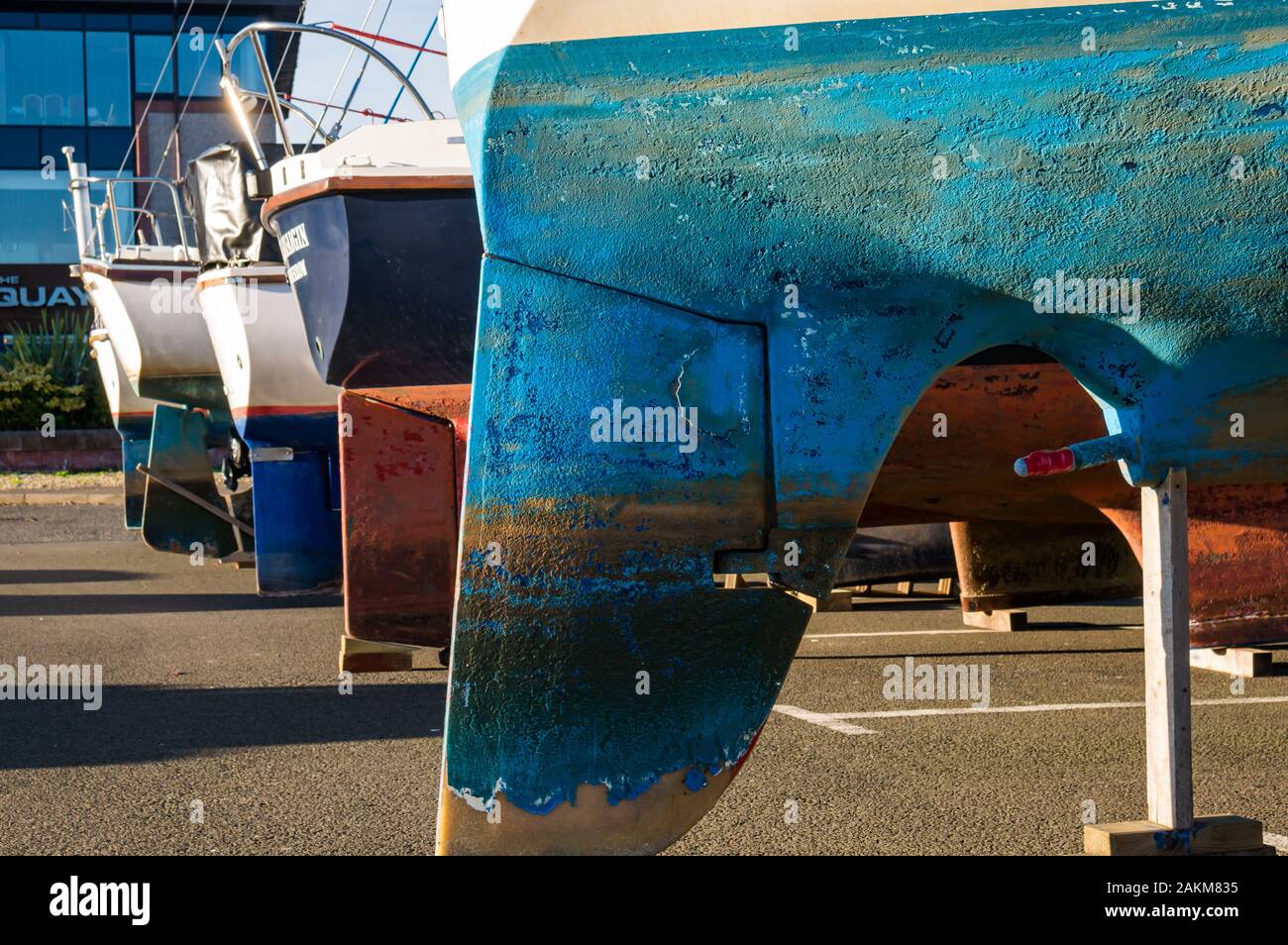 Rudders of boats out of water stored for Winter, Fisherrow Harbour ...