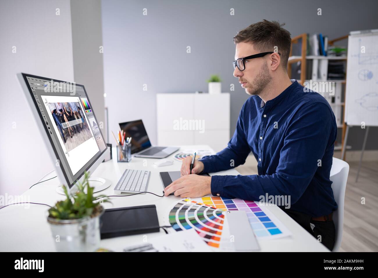 Close-up Of A Designer's Hand Editing Photo On Computer In Office Stock ...