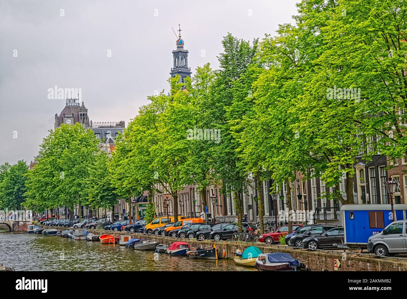 Amsterdam historic buildings by the river canal Stock Photo - Alamy