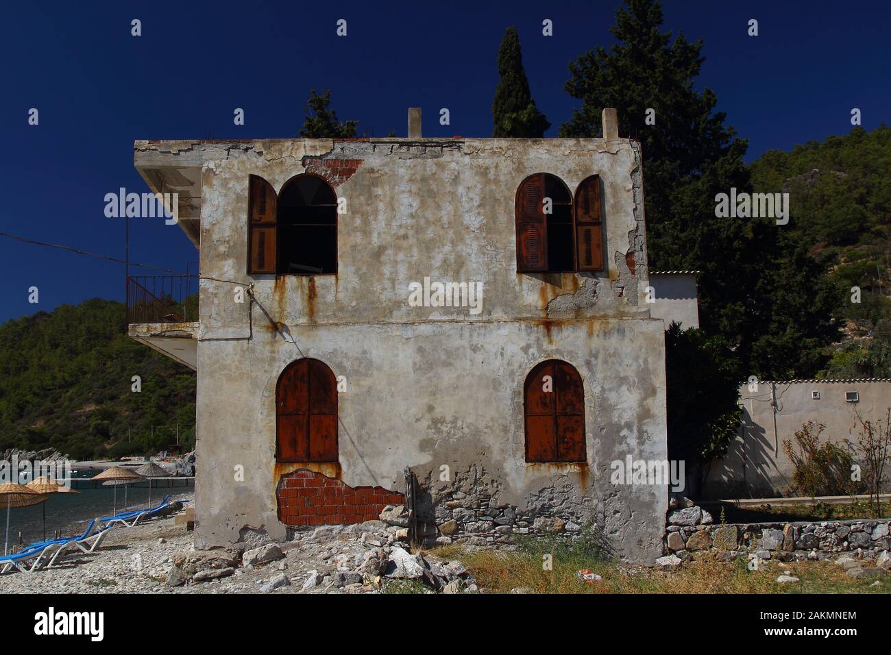 An old house built with bricks and stone A simple village architecture ...