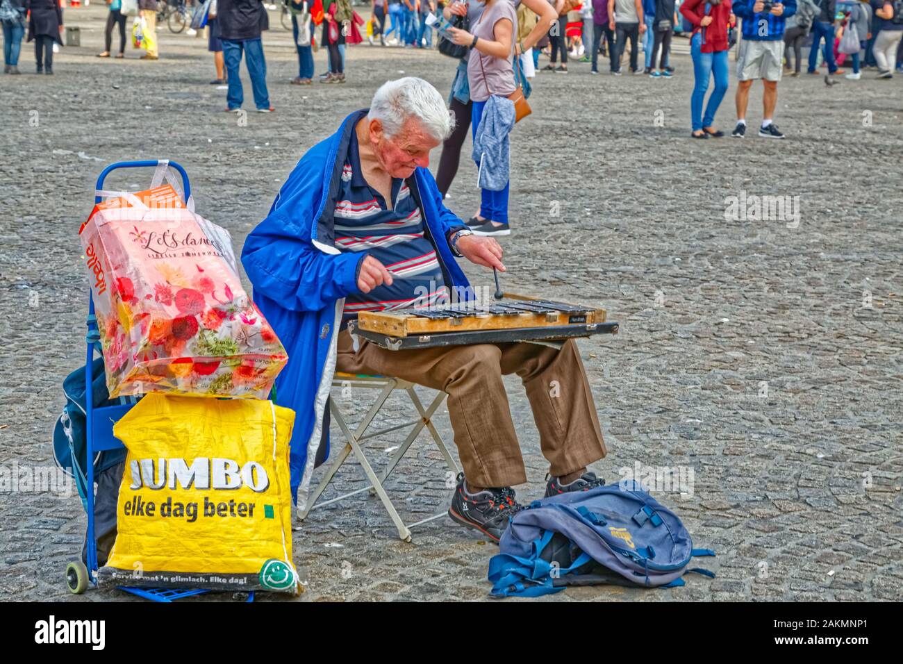 Amsterdam music artist at the Dam square Stock Photo - Alamy