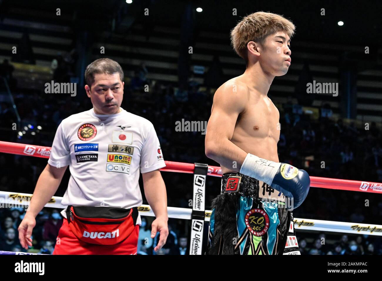 Kosei Tanaka of Japan (R) and his father and trainer Hitoshi Tanaka (L ...