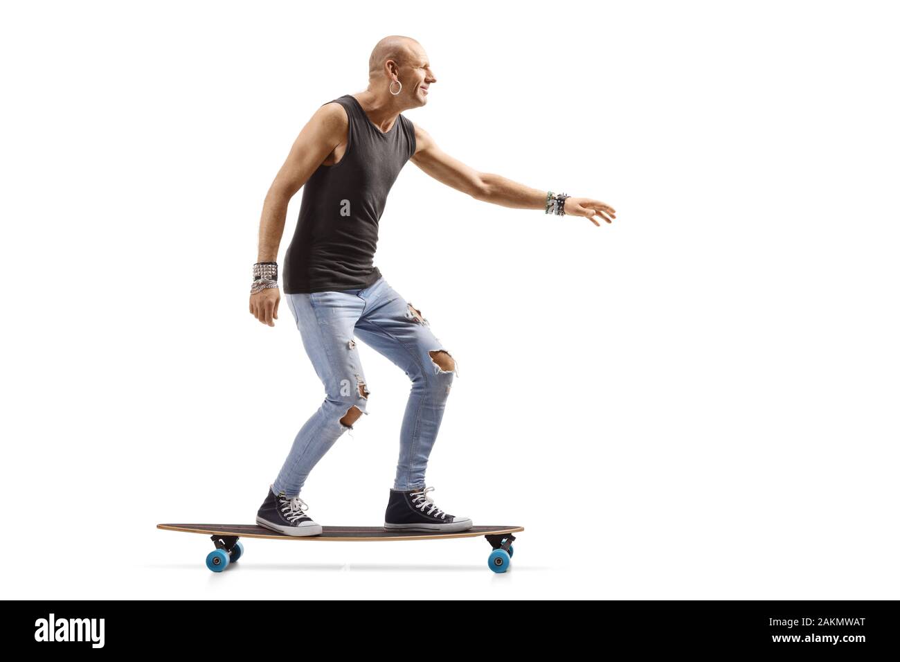 Bald male hipster riding a longboard isolated on white background Stock ...