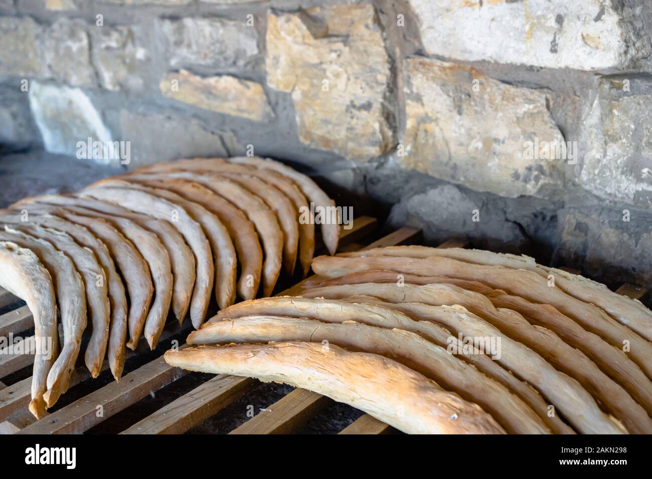 Traditional Georgian bread freshly baked outdoor. Traditional Georgian ...