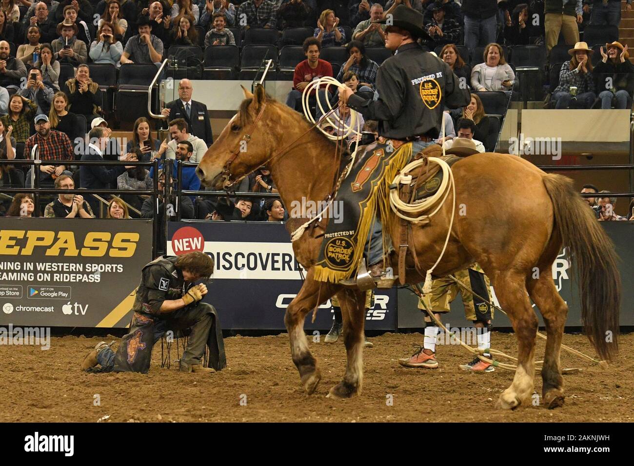 Dylan Smith reacts after his ride during the Professional Bull Riders ...