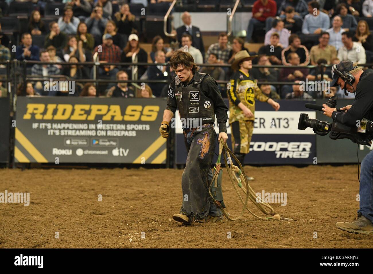 Dylan Smith walks away from the wreck during the Professional Bull ...