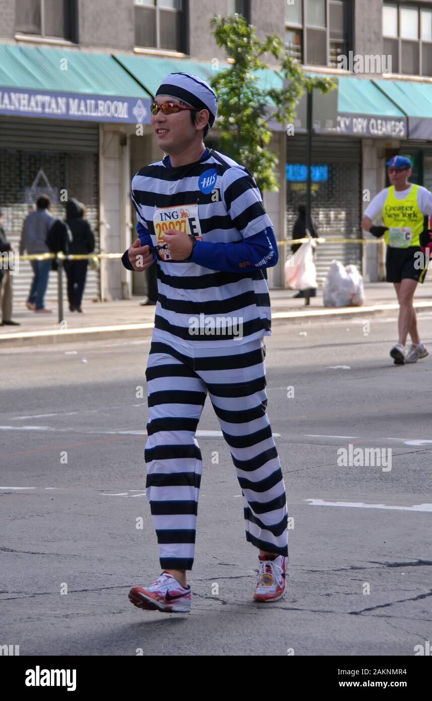Black white striped prison uniform hi-res stock photography and images ...