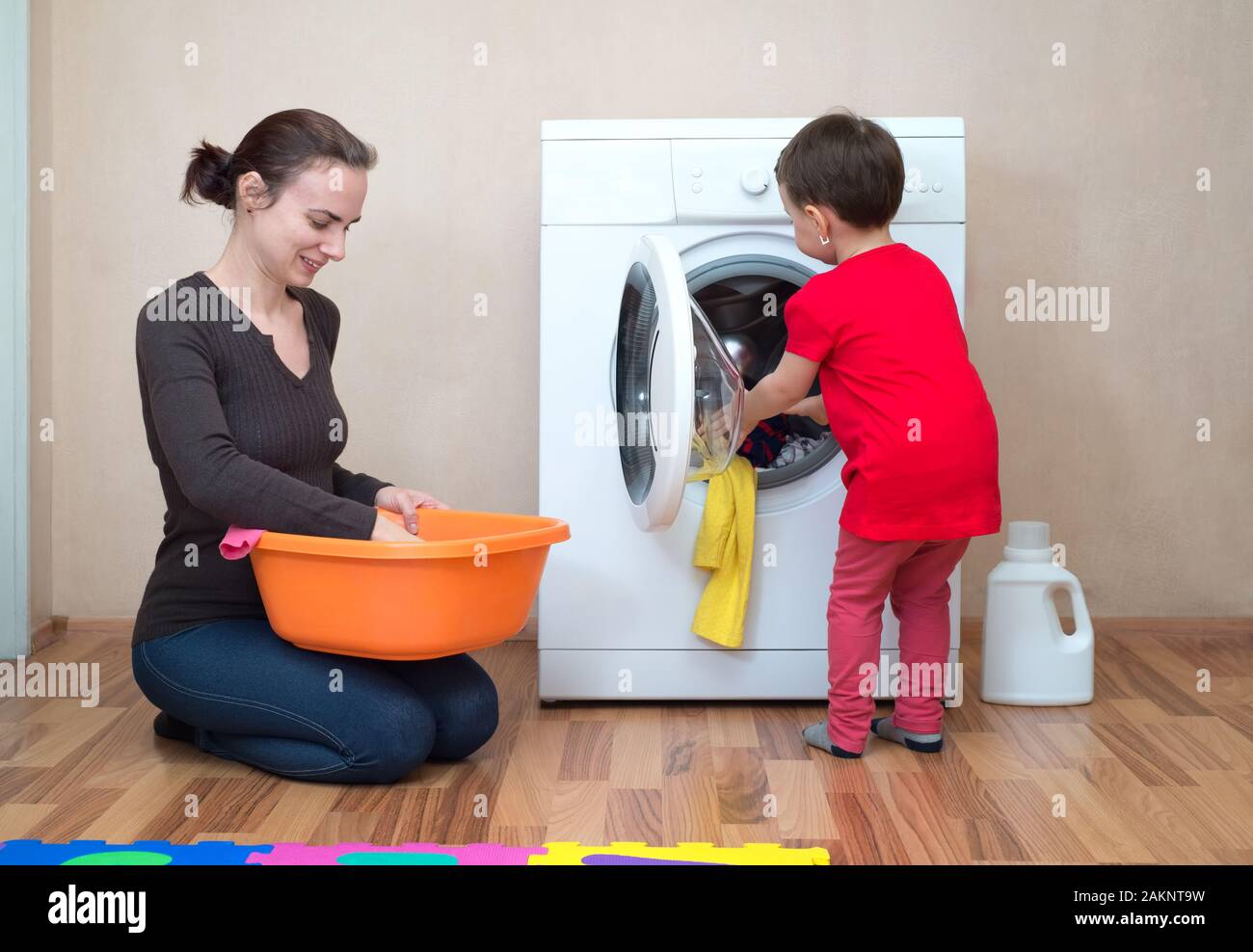 Child washing machine hi-res stock photography and images - Alamy