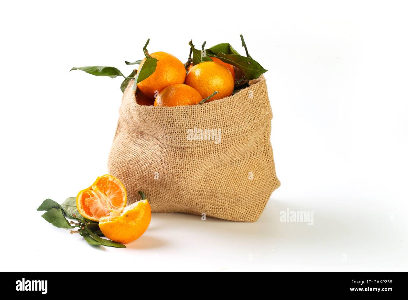 Harvesting orange fruit Cut Out Stock Images & Pictures - Alamy