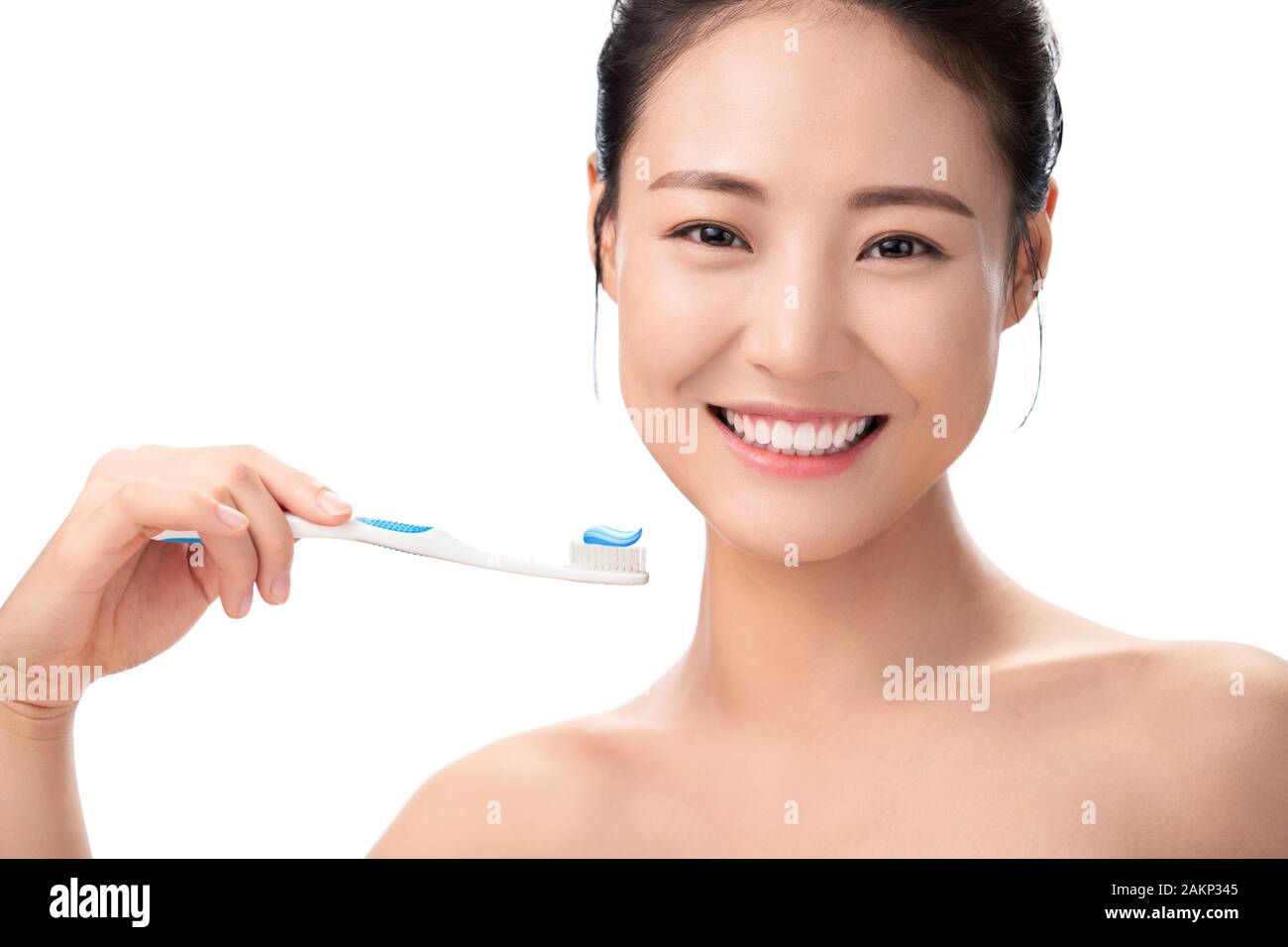 Young women to brush your teeth Stock Photo - Alamy