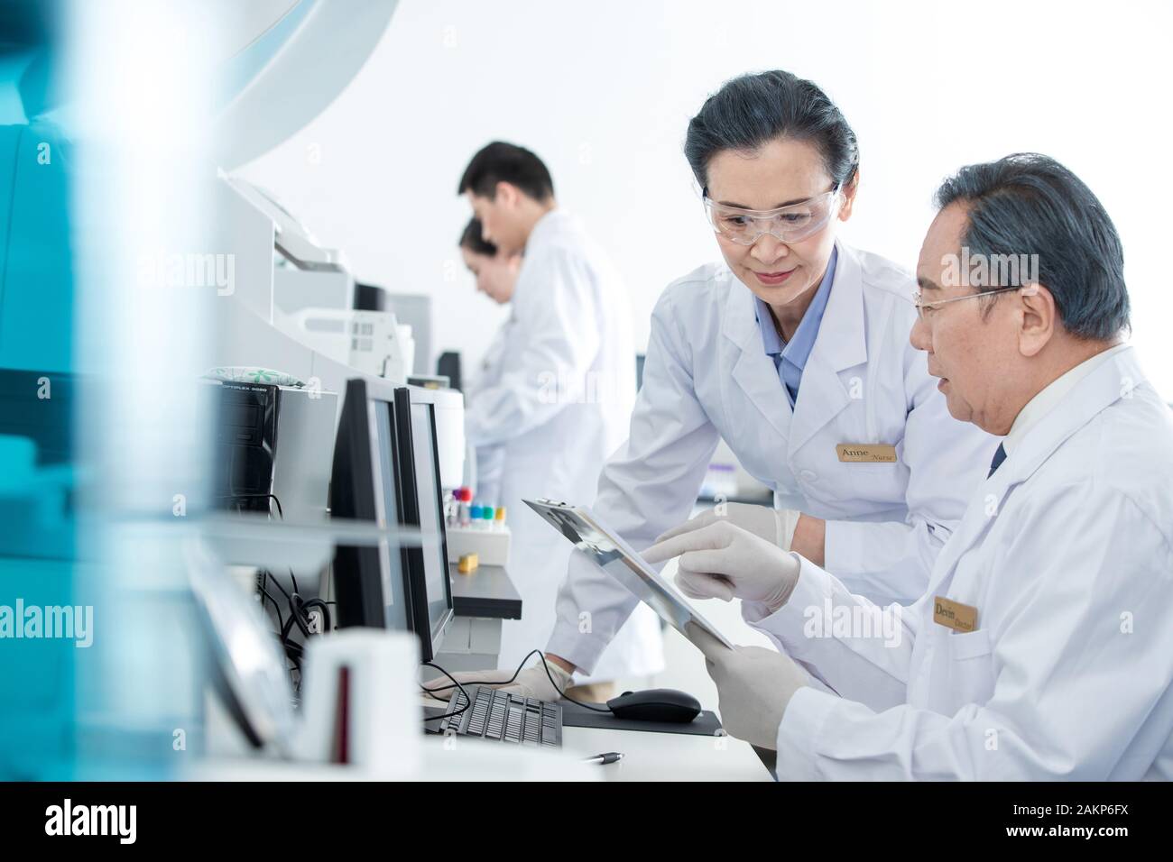 Medical experts to do research and analysis Stock Photo - Alamy