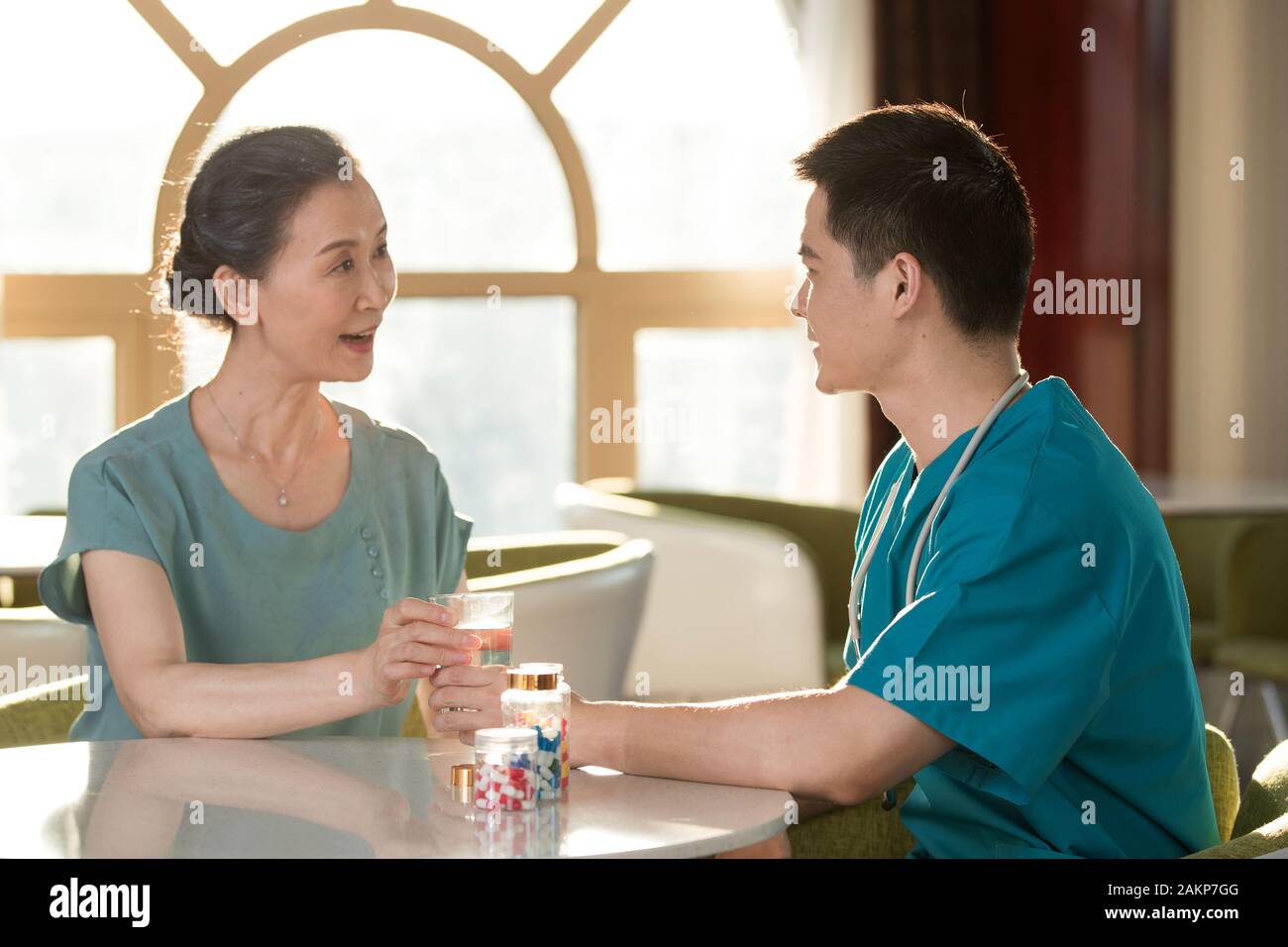 Doctors and patients Stock Photo - Alamy