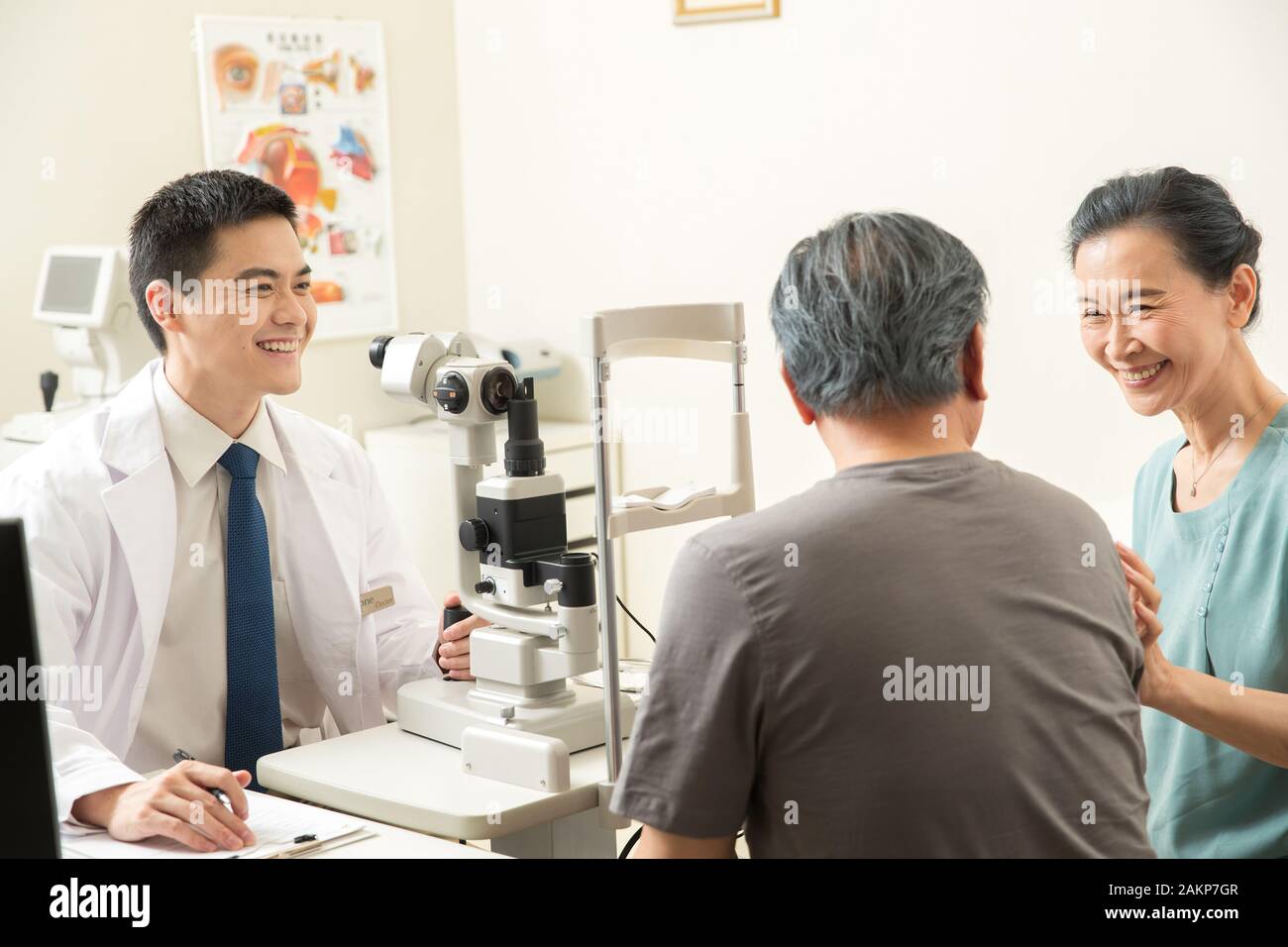 Doctors give patients eyes checked Stock Photo - Alamy