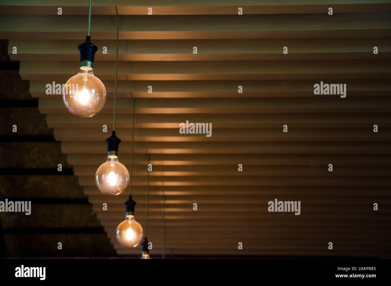 round light lamp hanging on wooden ceiling Stock Photo - Alamy