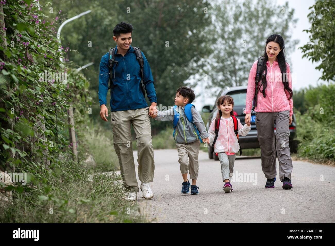 Happy family outdoor outing Stock Photo - Alamy