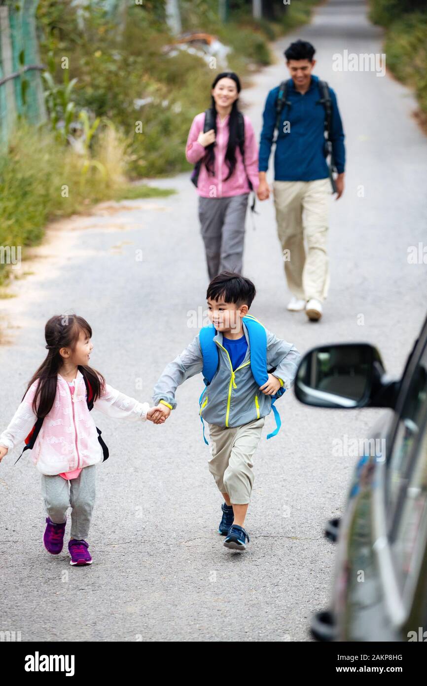 Happy family outdoor outing Stock Photo - Alamy