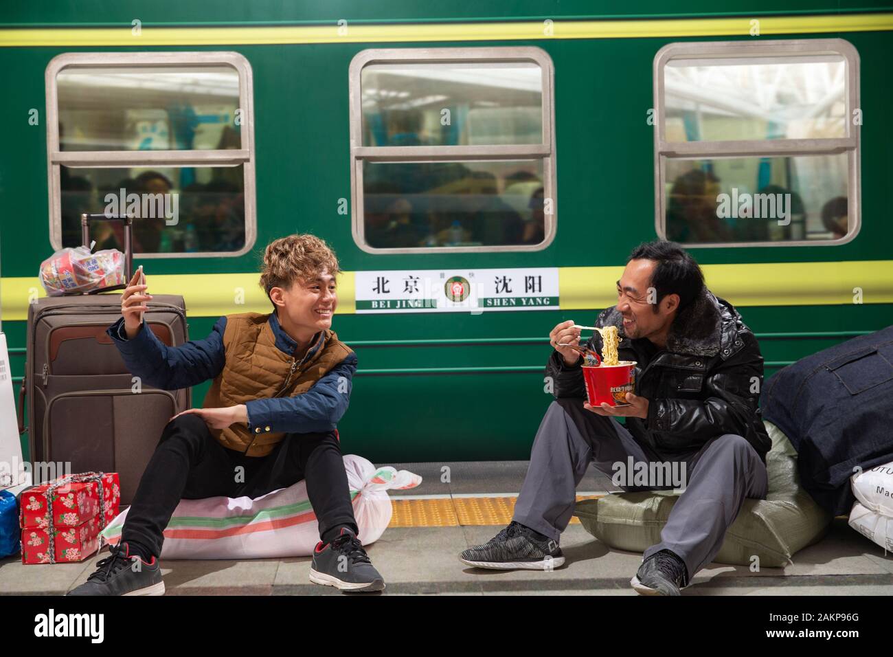 Two men watch hi-res stock photography and images - Alamy