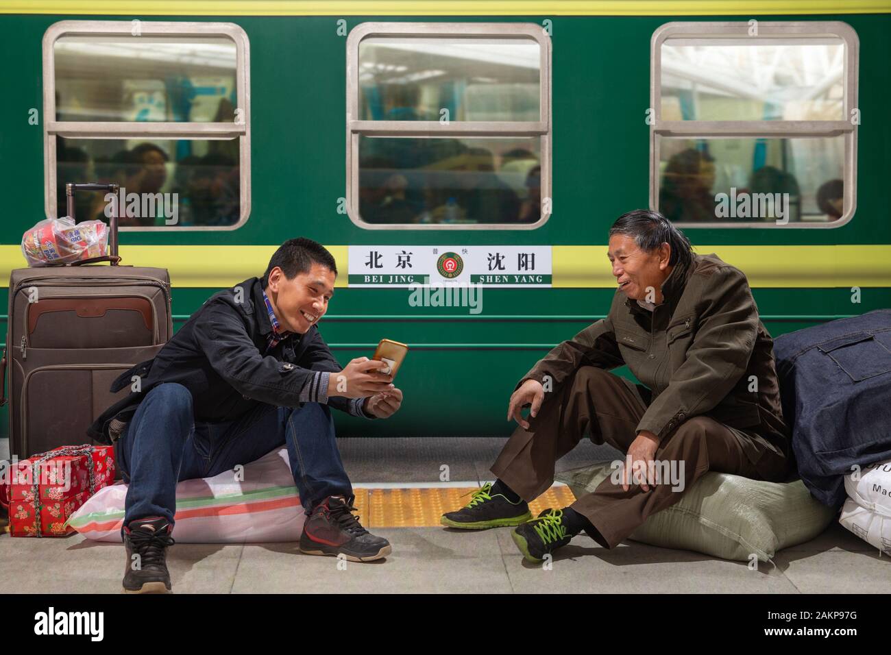Two men sitting in train hi-res stock photography and images - Alamy
