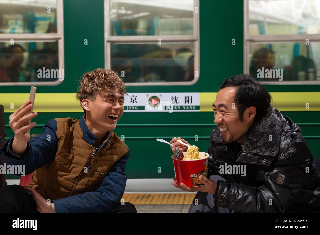 Two men watch hi-res stock photography and images - Alamy