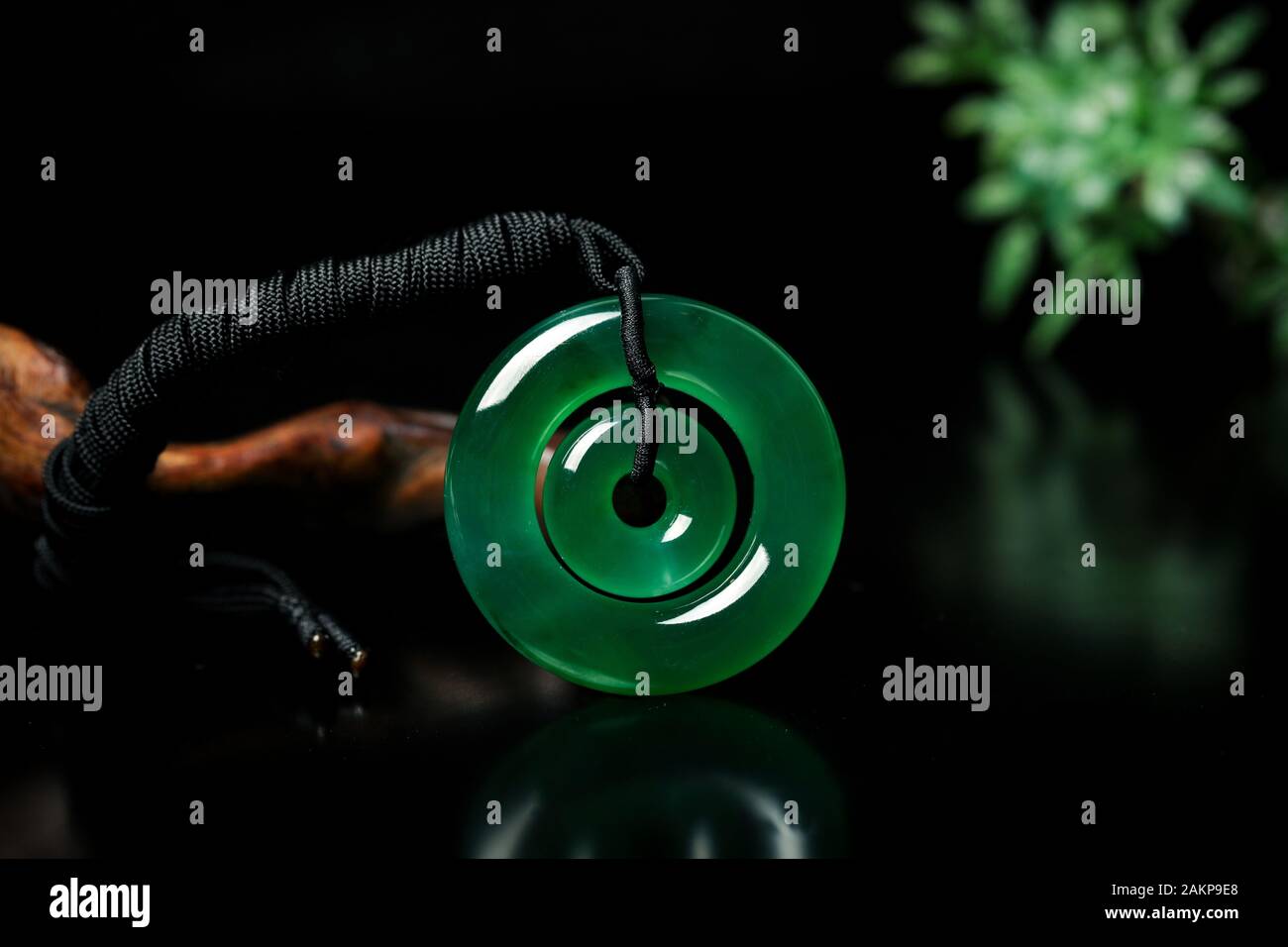 Round jade pendant features Stock Photo - Alamy