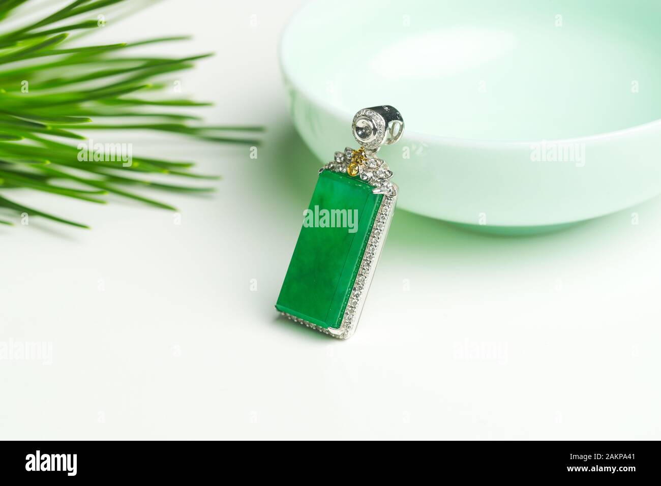 Green square jade pendant features Stock Photo - Alamy