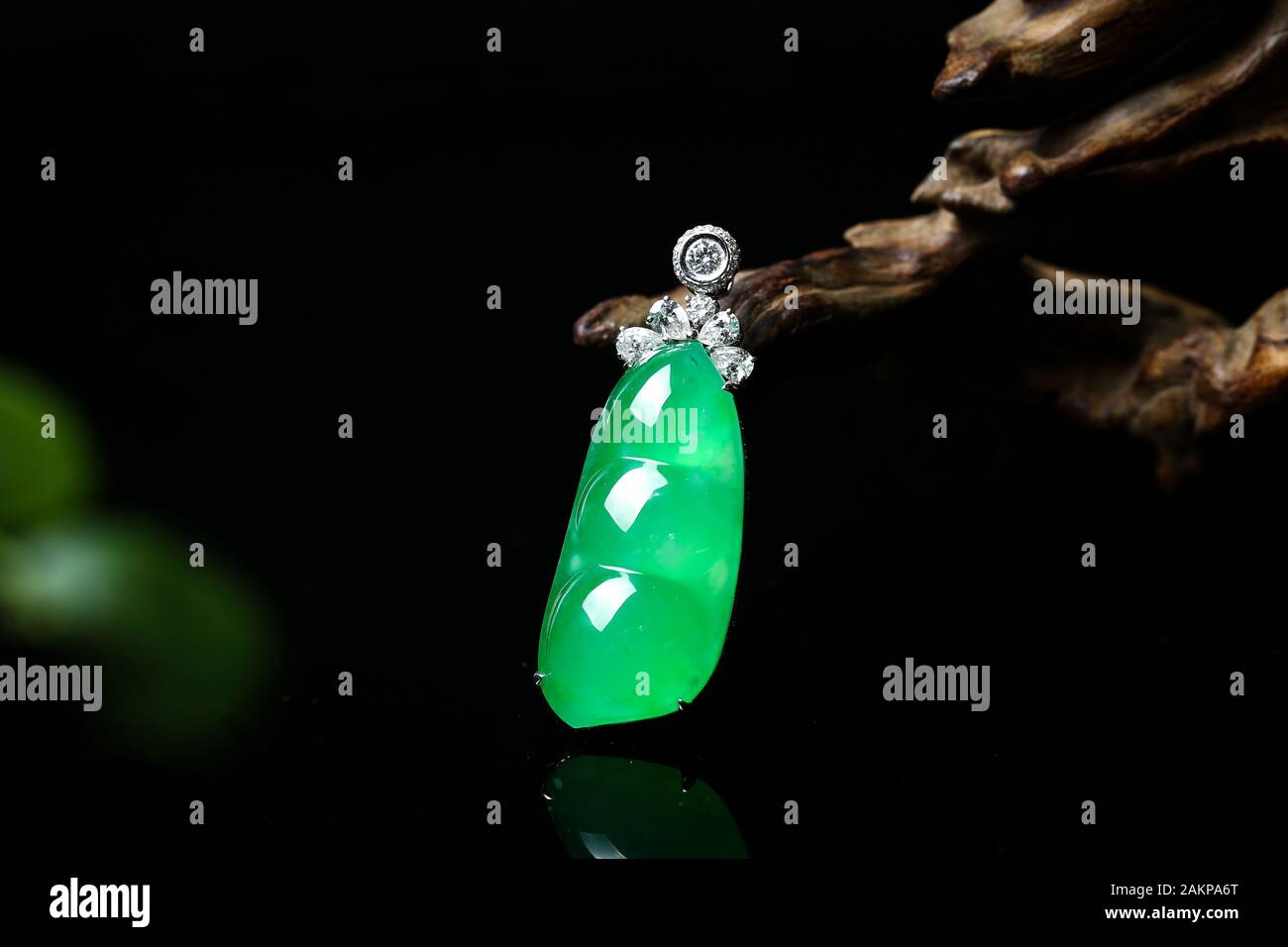 Imperial green jadeite jade pendant Stock Photo - Alamy