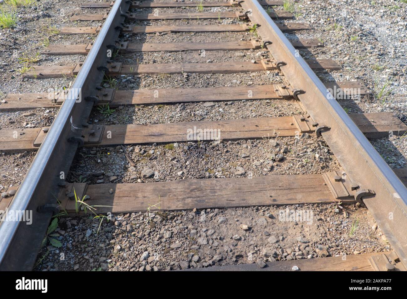 Iron Rusty Train Railway Detail Over Dark Stones Stock Photo - Alamy