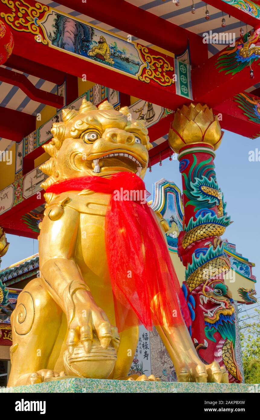 golden kirin sculpture in front of chinese shine Stock Photo - Alamy