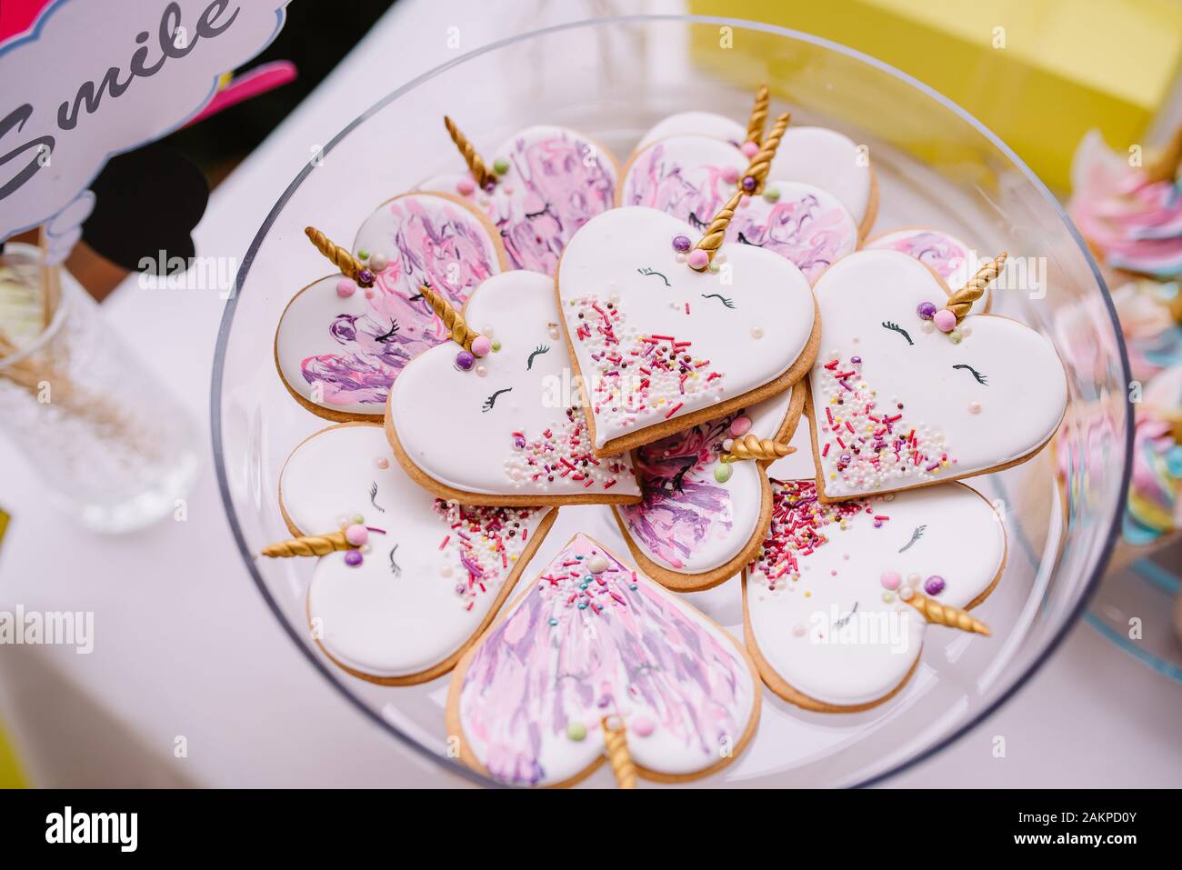 Gingerbread cookies covered with multi colored icing in pale pastel ...