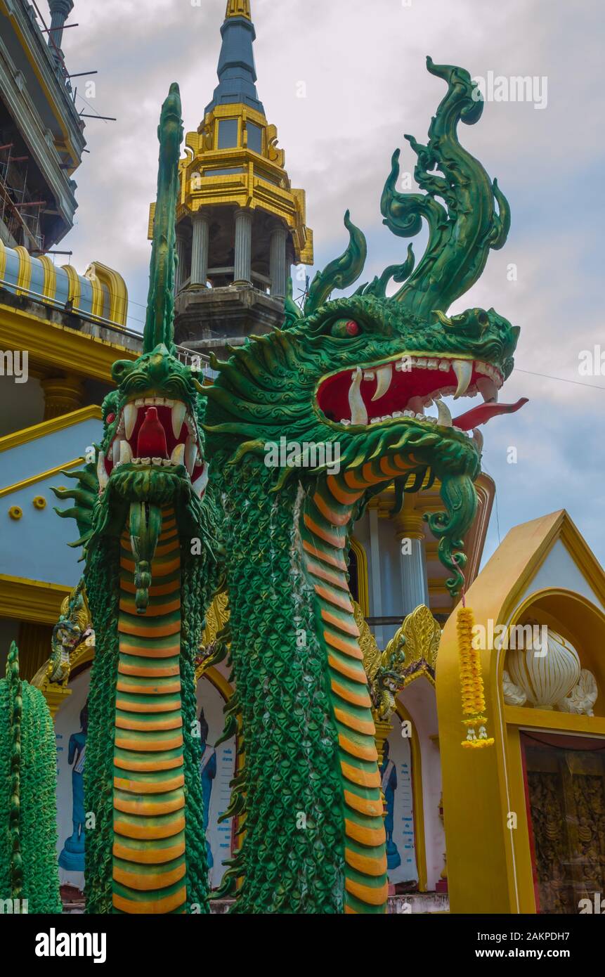 Naga sculpture in vertical in temple at Krabi Stock Photo - Alamy