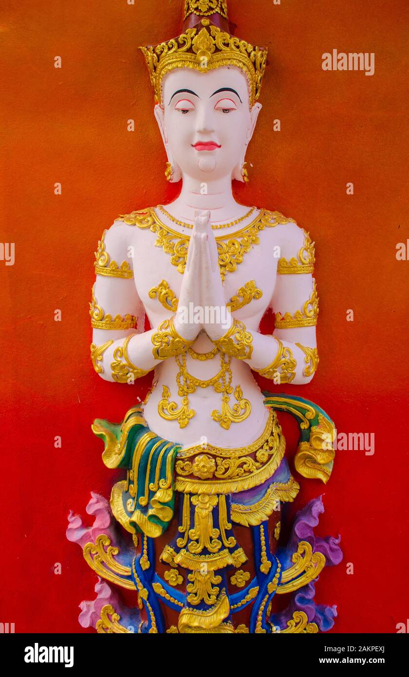 fairy statue in position of put the palms of the hands together in ...