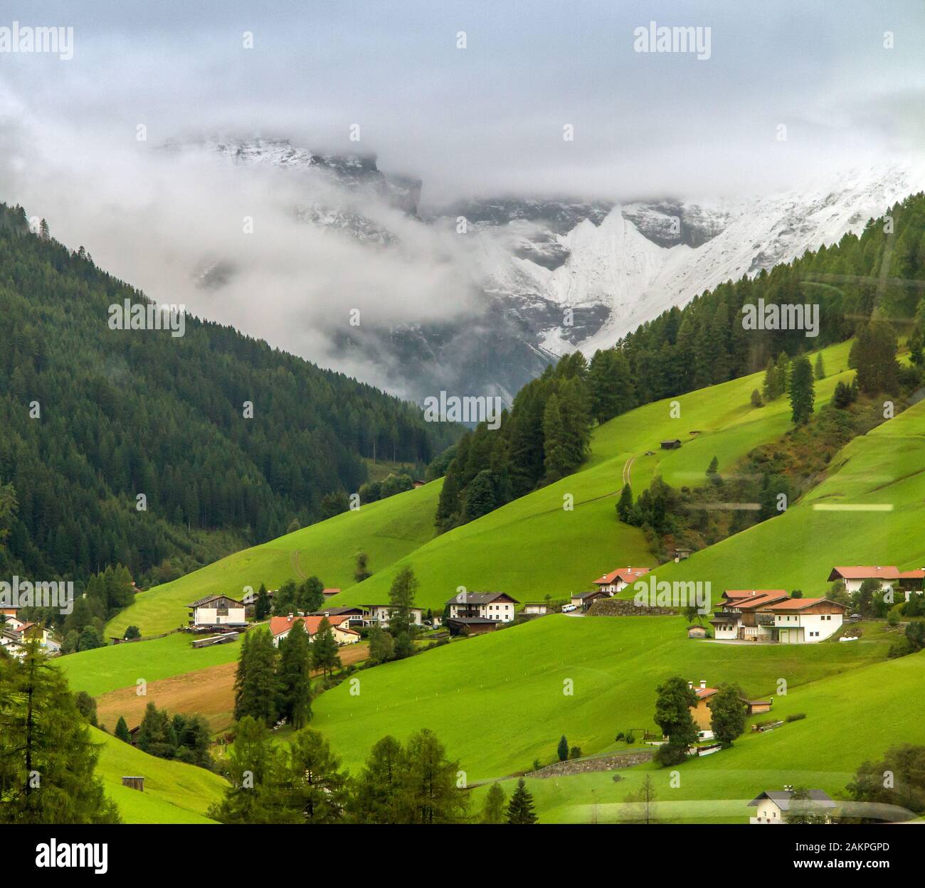 The small town under the Swiss Alps Stock Photo - Alamy