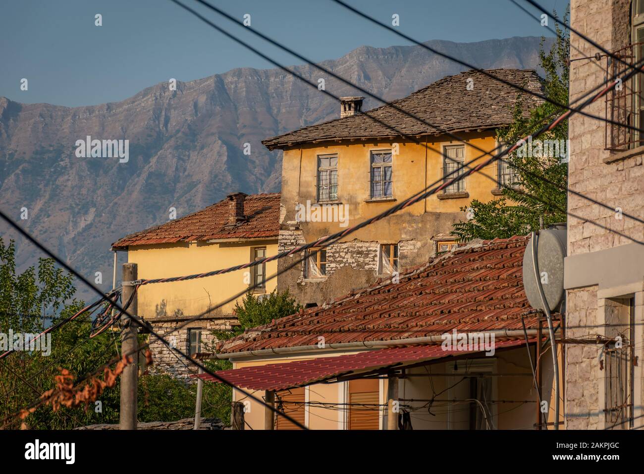 Medieval houses surrounded by mountains in Gjirokaster, Albania Stock ...