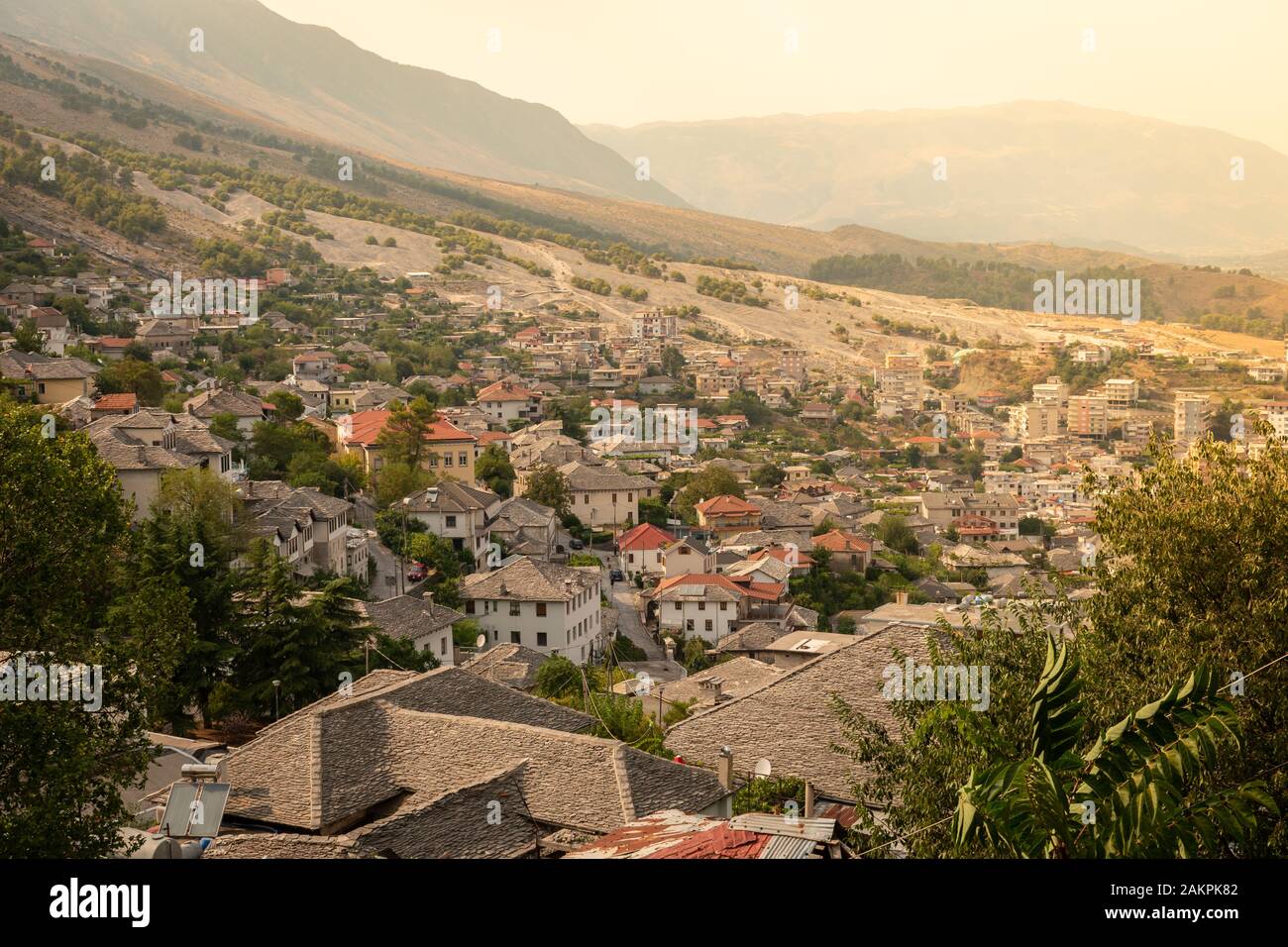 Overlooking the old town with medieval houses in Gjirokaster, Albania ...