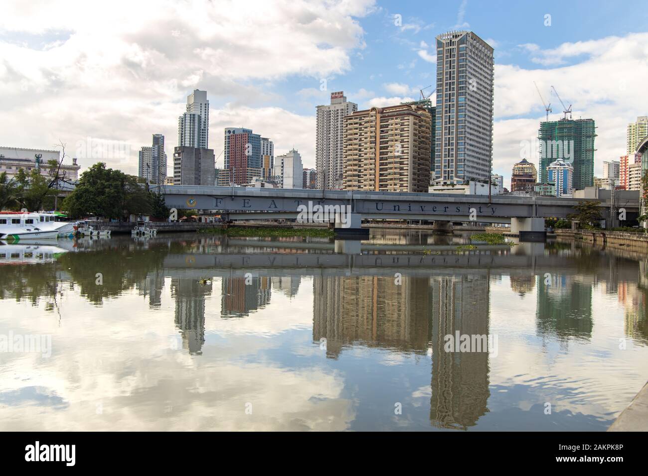 Dec 31, 2019 Manila downtown cityscape seen from the Pasig river ...