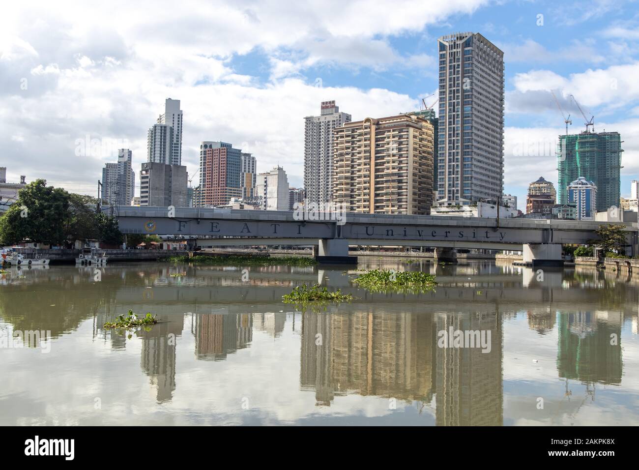 Dec 31, 2019 Manila downtown cityscape seen from the Pasig river ...