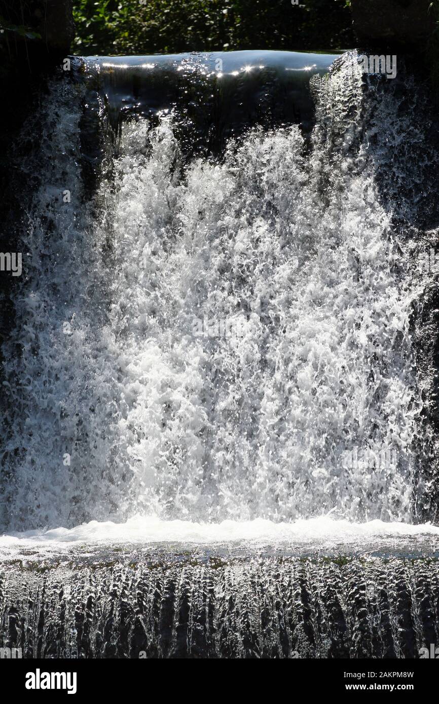 River overflow or a small dam overflow. Water supply Stock Photo - Alamy