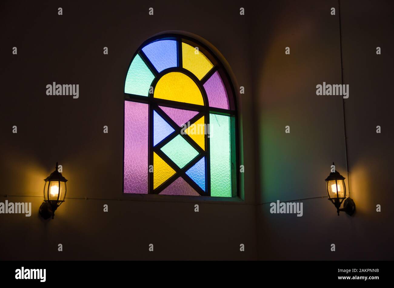 colorful glass window with lamp light Stock Photo - Alamy