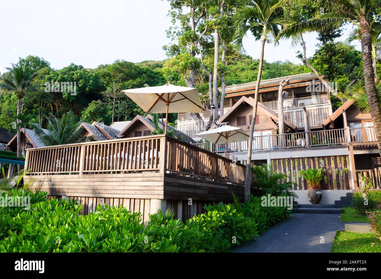 wooden resort with tree background Stock Photo - Alamy