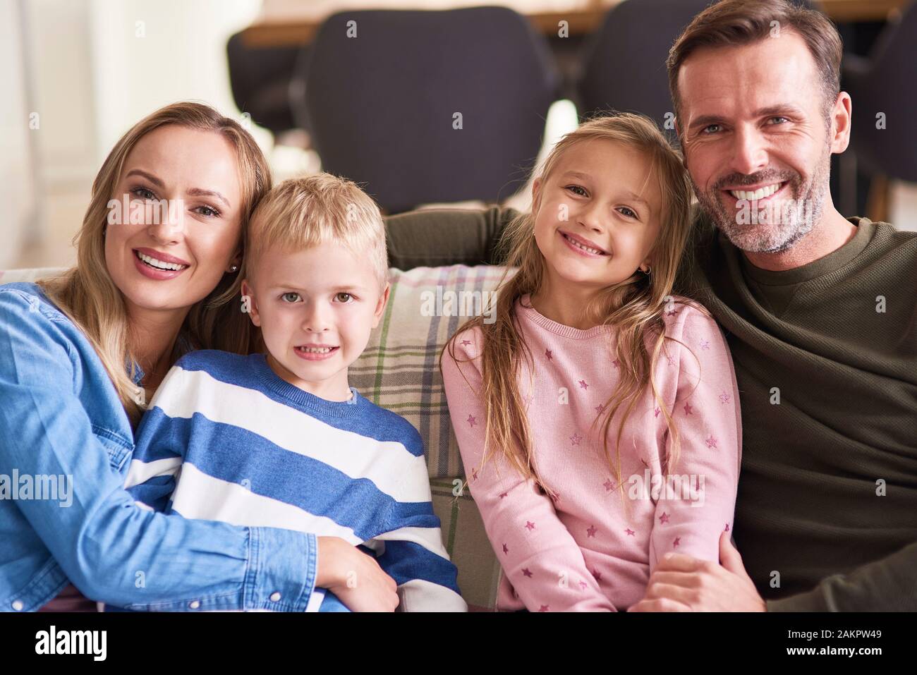 Portrait of smiling family with two children Stock Photo - Alamy