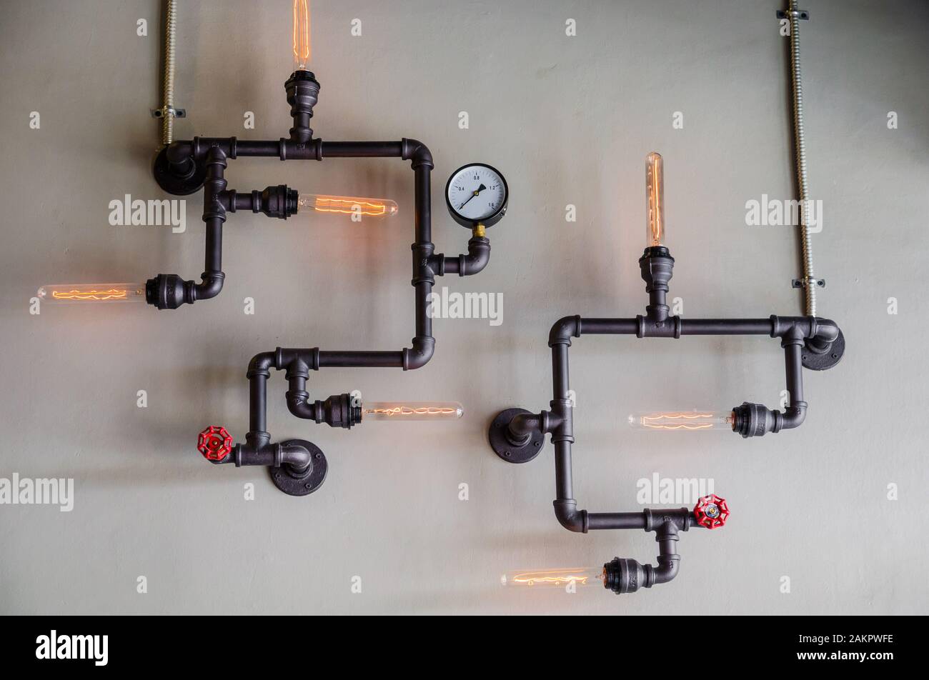 steel pipe and lamp on wall Stock Photo - Alamy