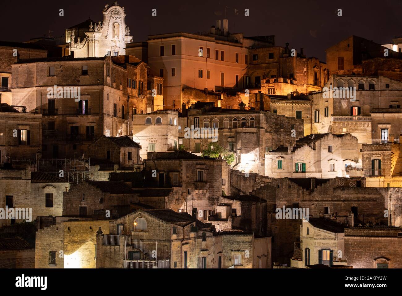 Amazing lighted buildings in ancient Sassi district by night in Matera ...