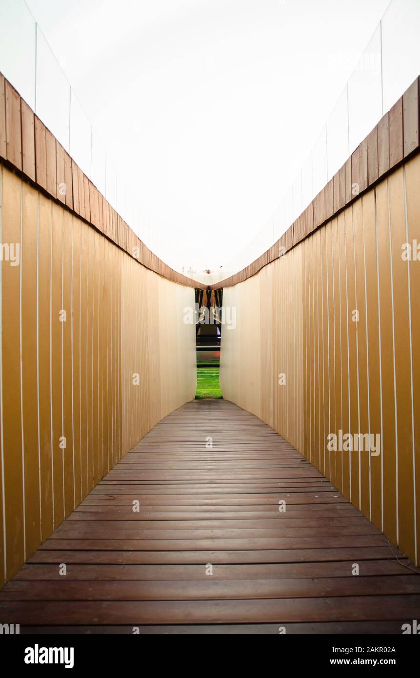 wooden tunnel walkway with white sky Stock Photo - Alamy
