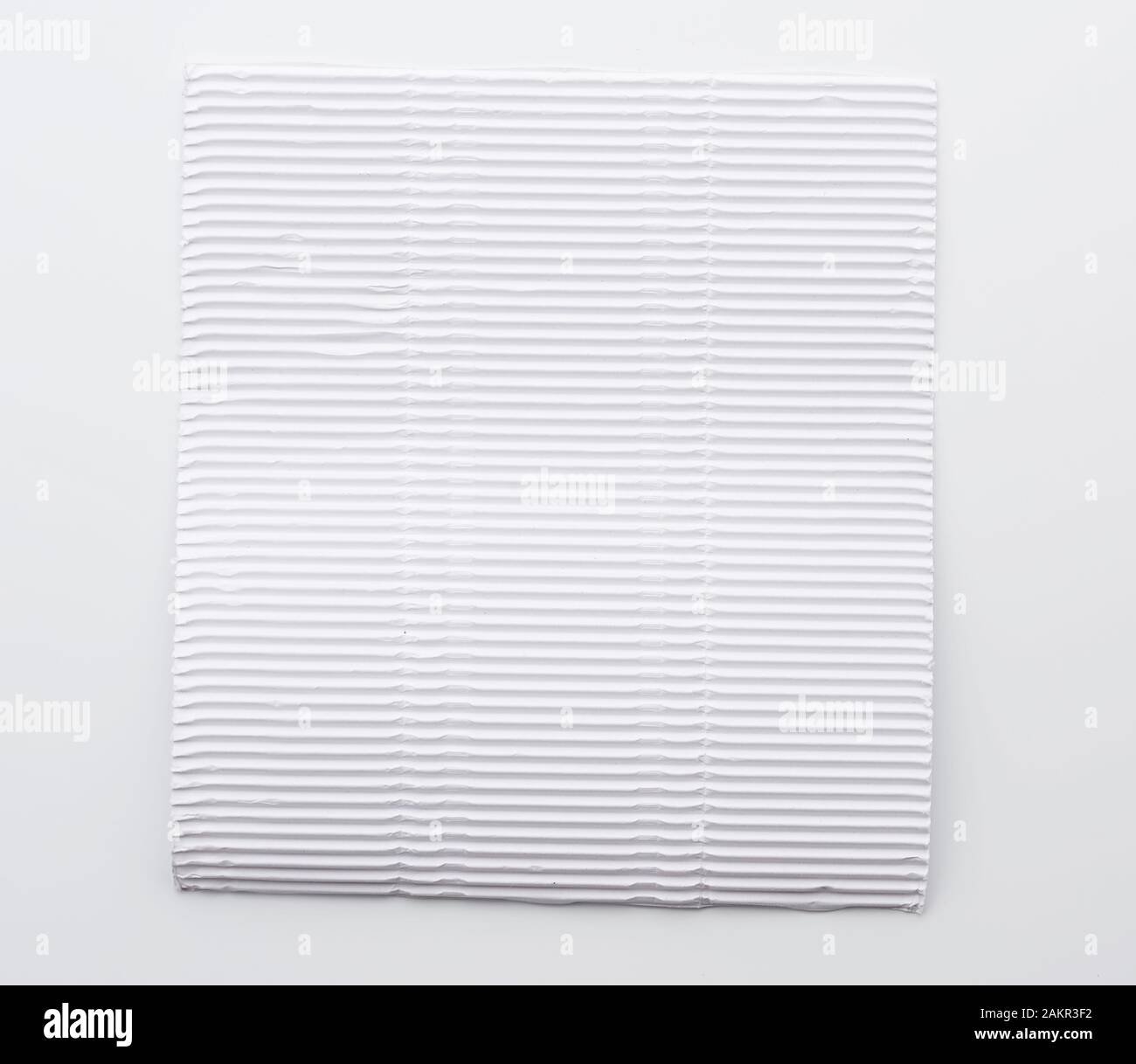 white blank corrugated paper sheet on white background , close up Stock ...
