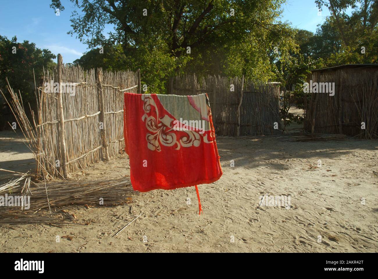 Red rug on washing line, Mwandi, Zambia, Africa Stock Photo - Alamy