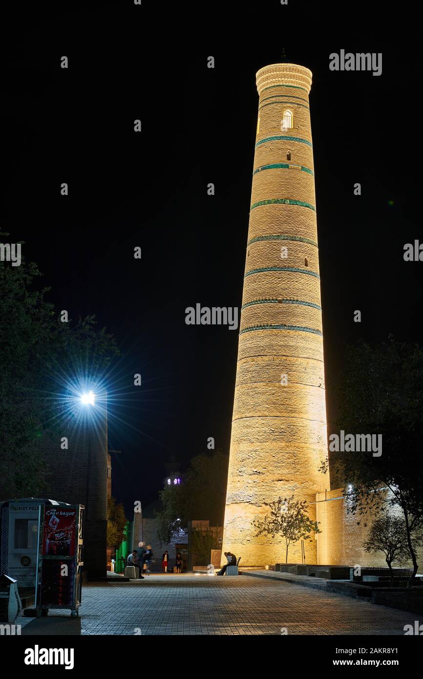 night shot of minaret of Djuma Mosque also known as Juma Masjidi Va Minorasi, Itchan-Kala, Khiva ...