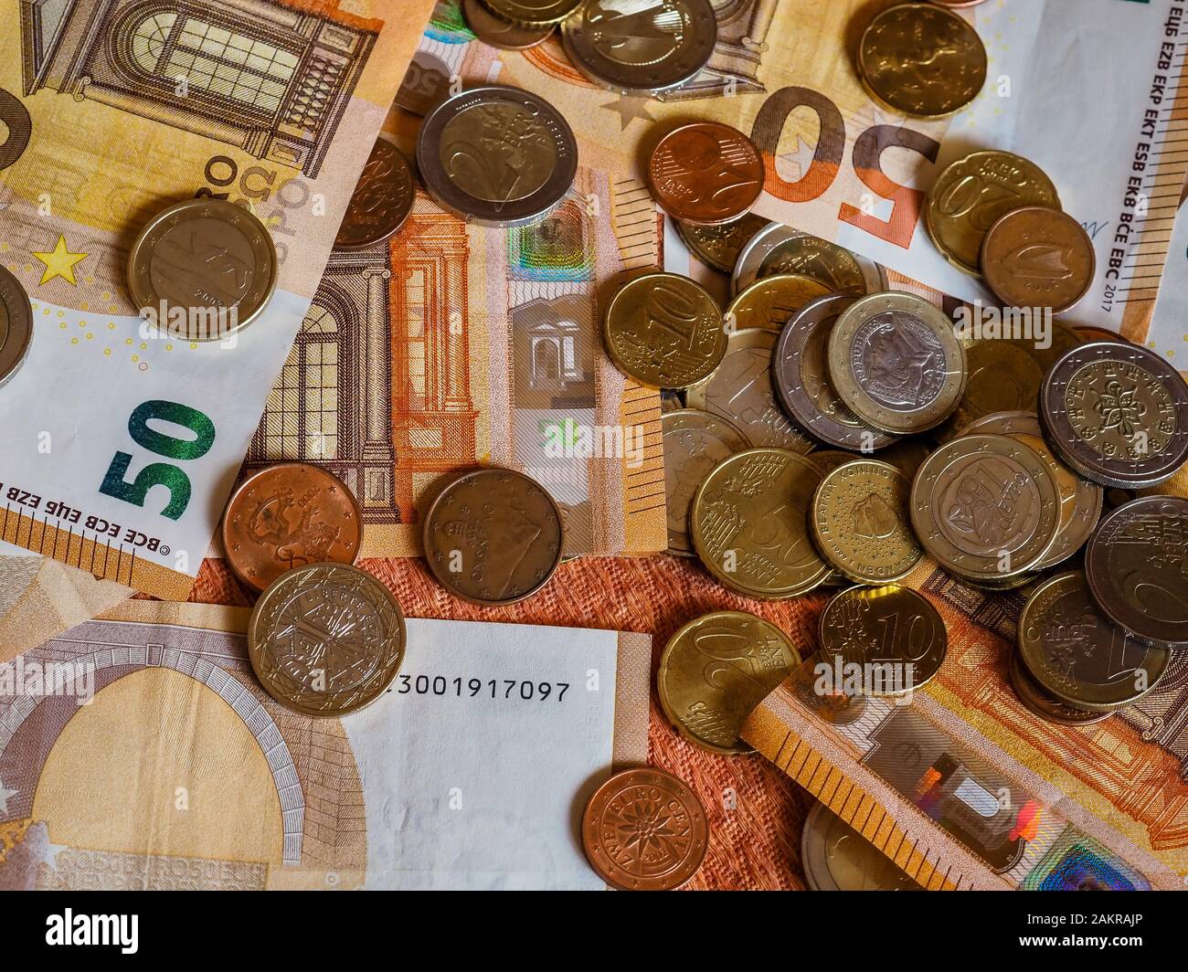 Euro banknotes and coins (EUR), currency of European Union Stock Photo ...