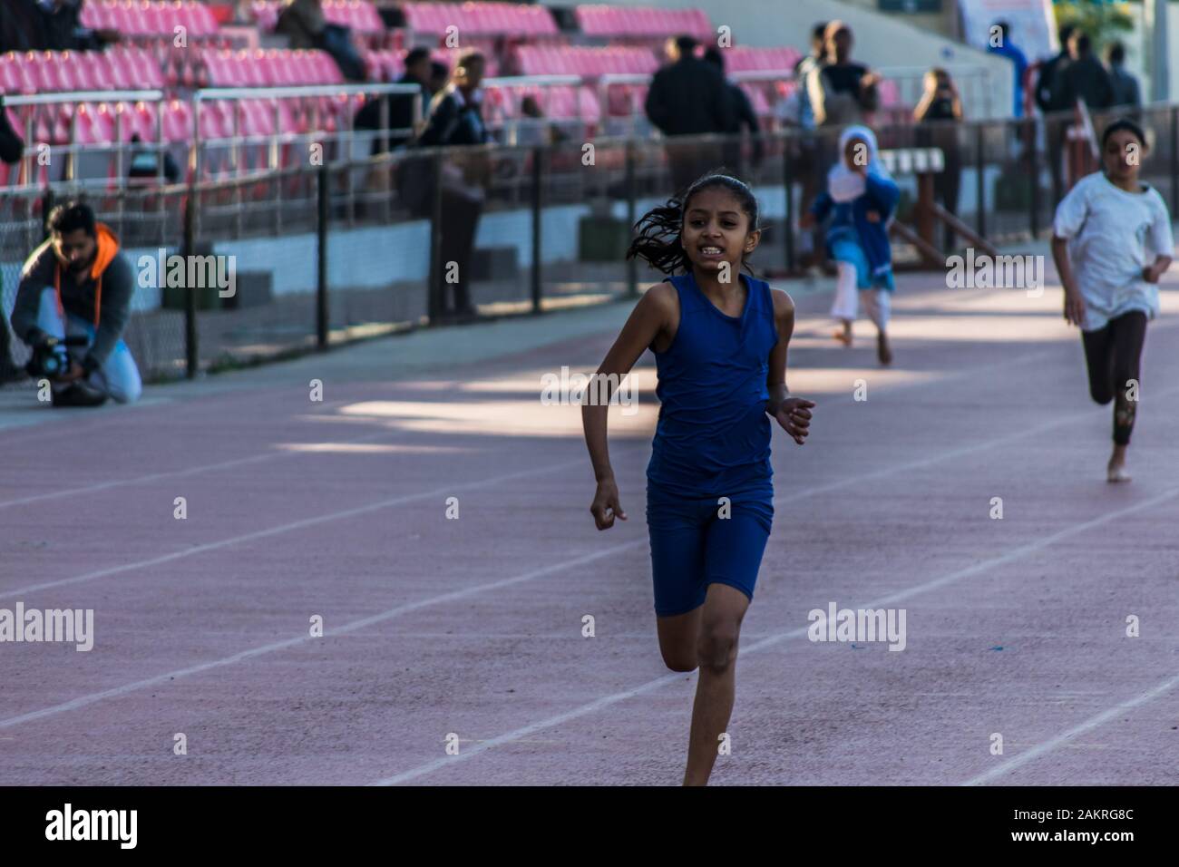 Woman athlete running 100 meter hi-res stock photography and images - Alamy