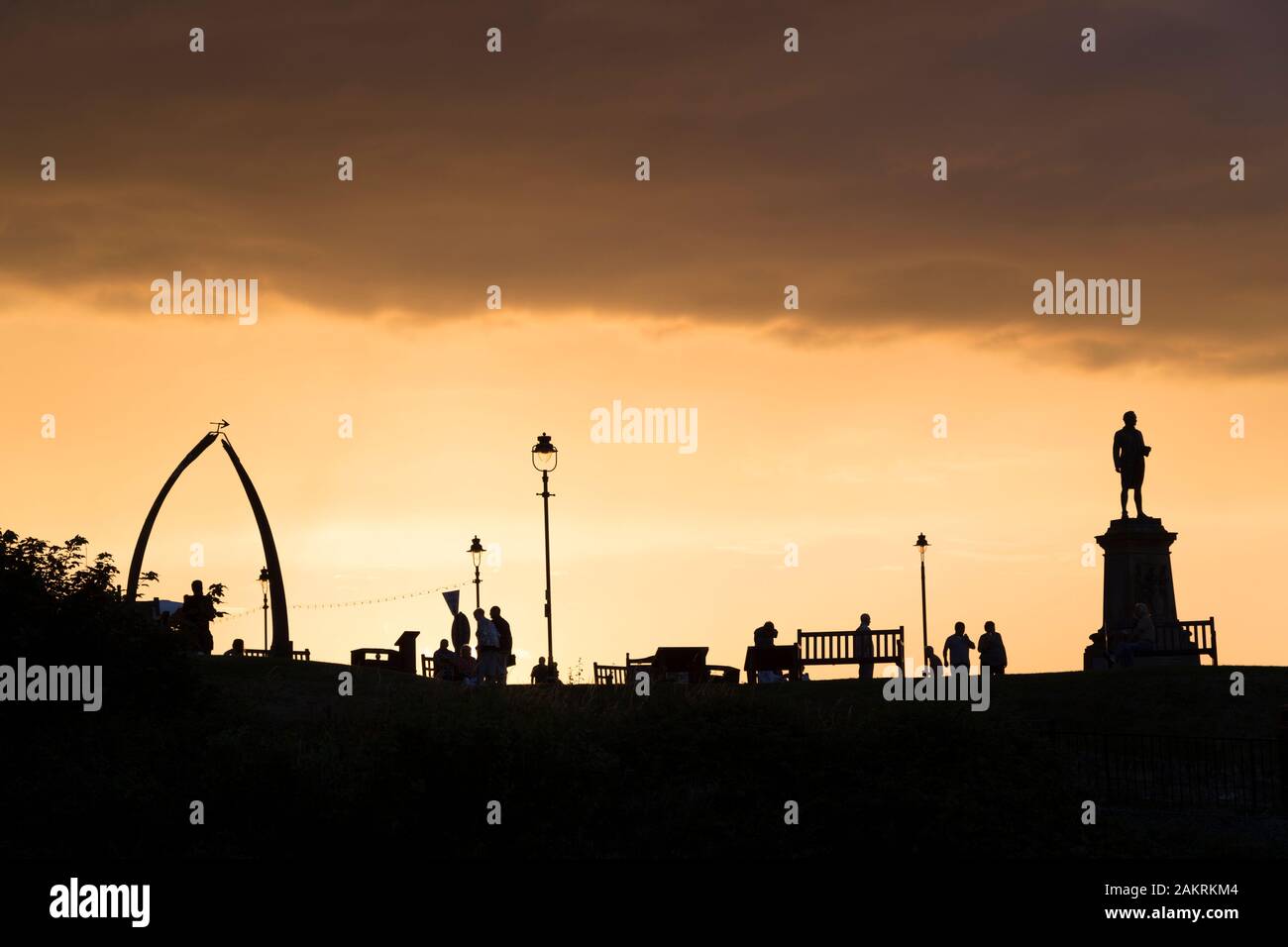 Whitby, the silhouette of the iconic whalebone arch and Captain Cook ...