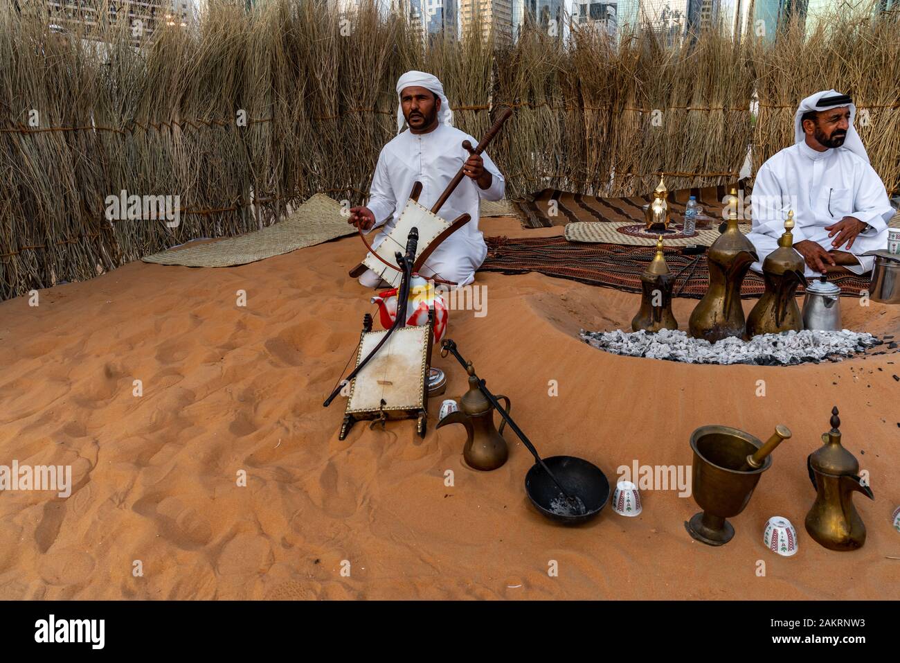 A Middle Eastern man singing and playing music | Arabic culture display ...